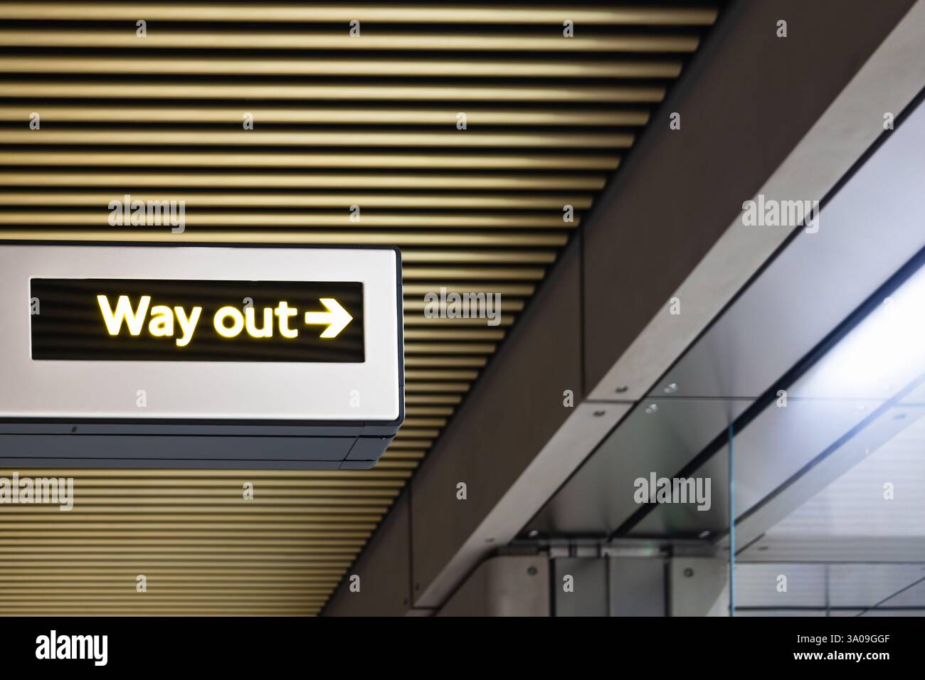 Illuminated - Way Out - sign in an underground metro station with ...