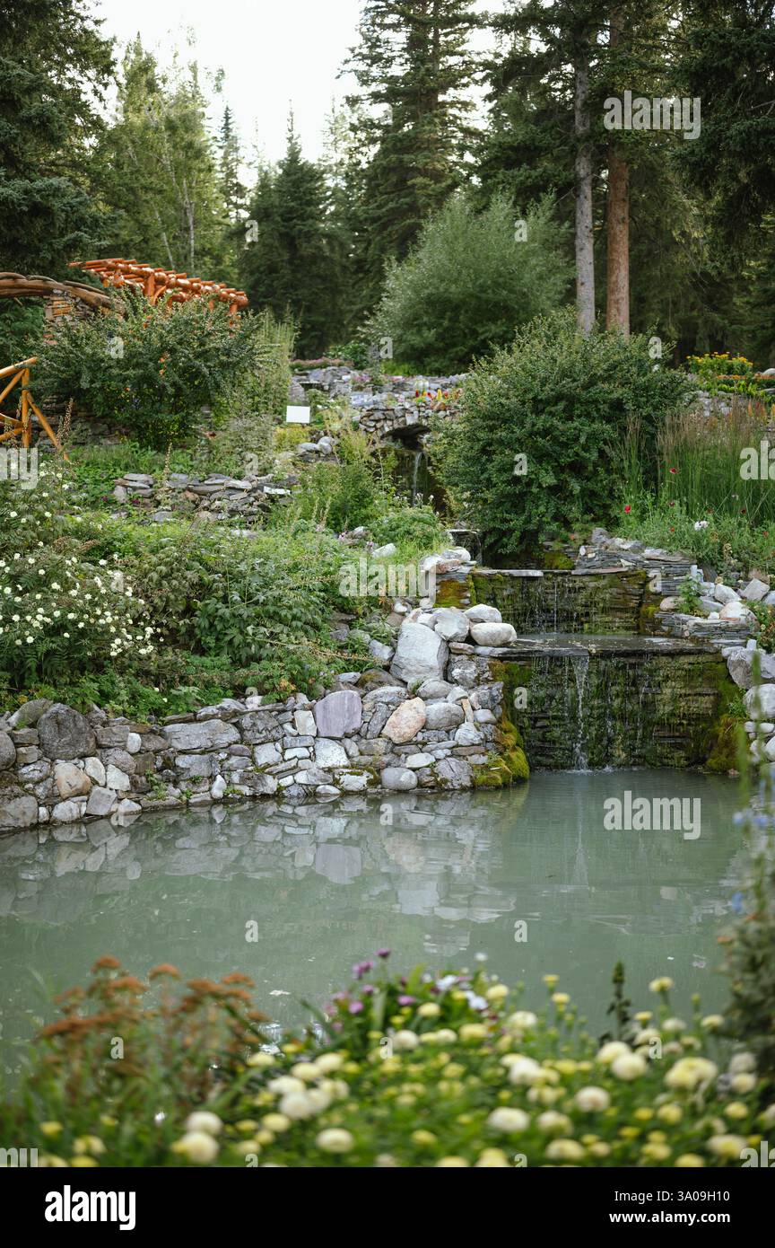 Cascading waterfall surrounded by greenery in Cascade of Time Gardens ...