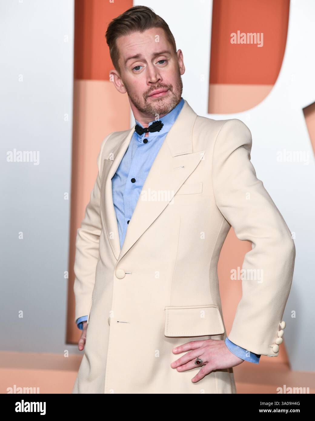 MaCaulay Culkin walking on the red carpet at the 2025 Vanity Fair Oscar ...