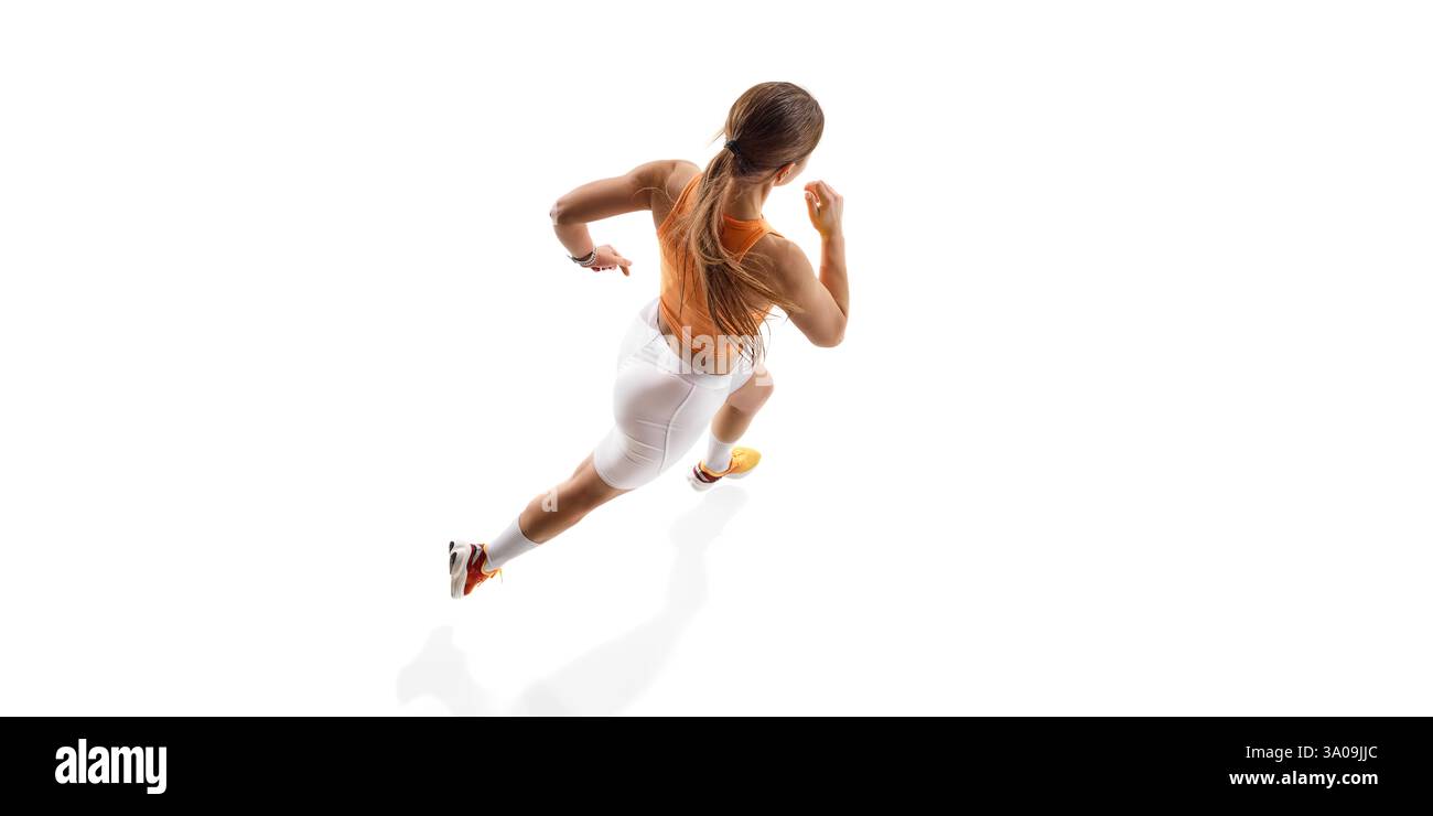 Top view of young woman, running athlete demonstrating endurance ...