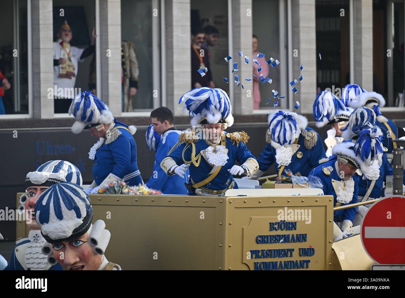 03 March 2025, North Rhine-Westphalia, Cologne: Carnival revelers throw ...