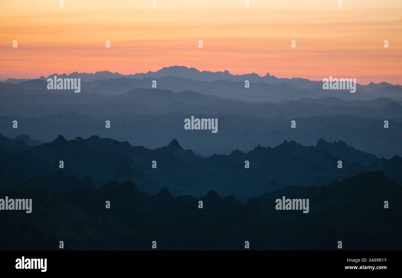 Mountain layers during blue hour Stock Photo - Alamy