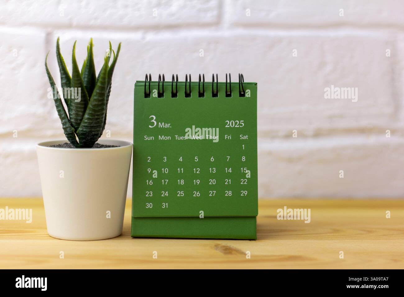 Hello March. March 2025 planning calendar on your desktop Stock Photo ...