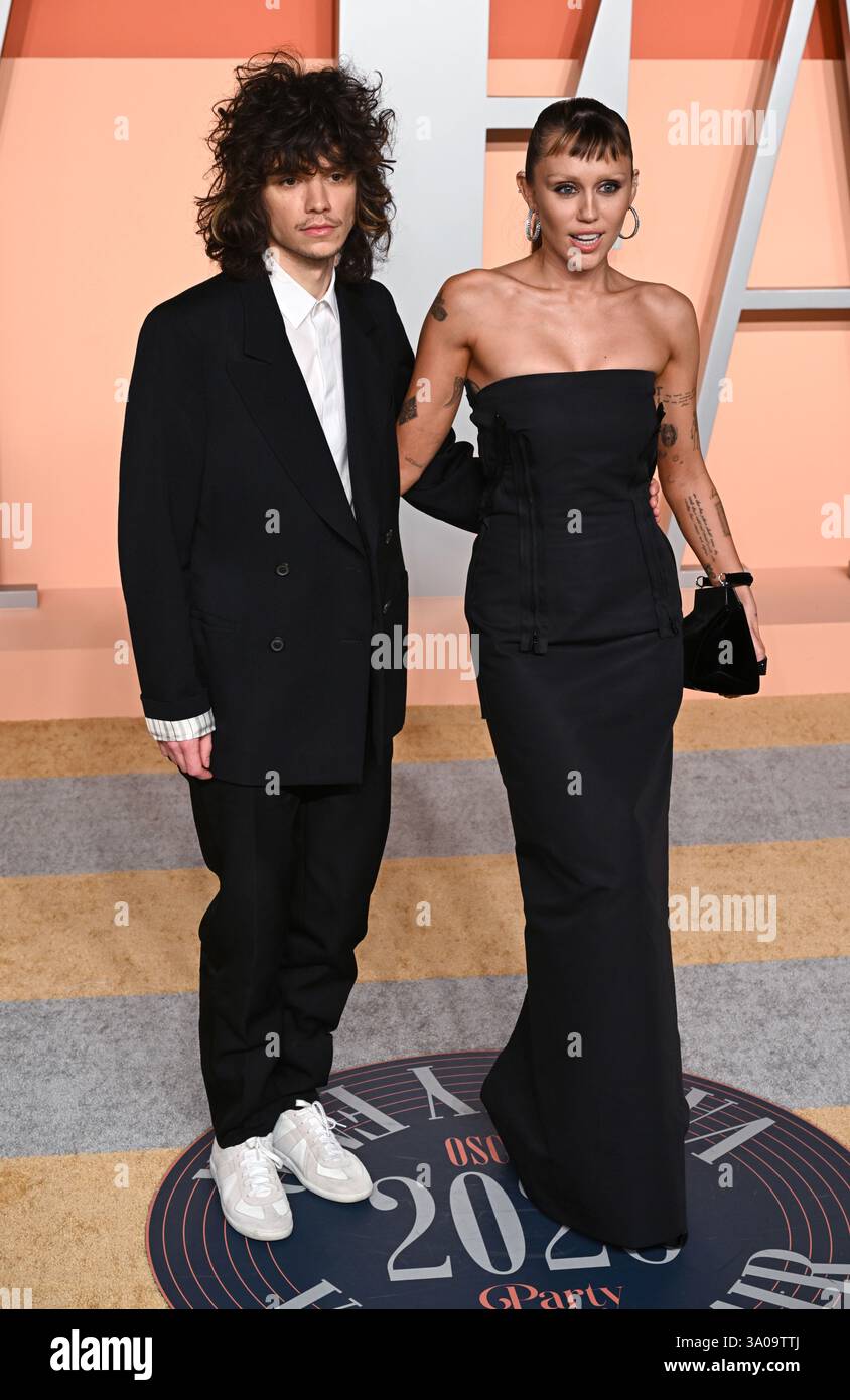 Los Angeles, USA. March 2nd, 2025. Maxx Morando and Miley Cyrus ...