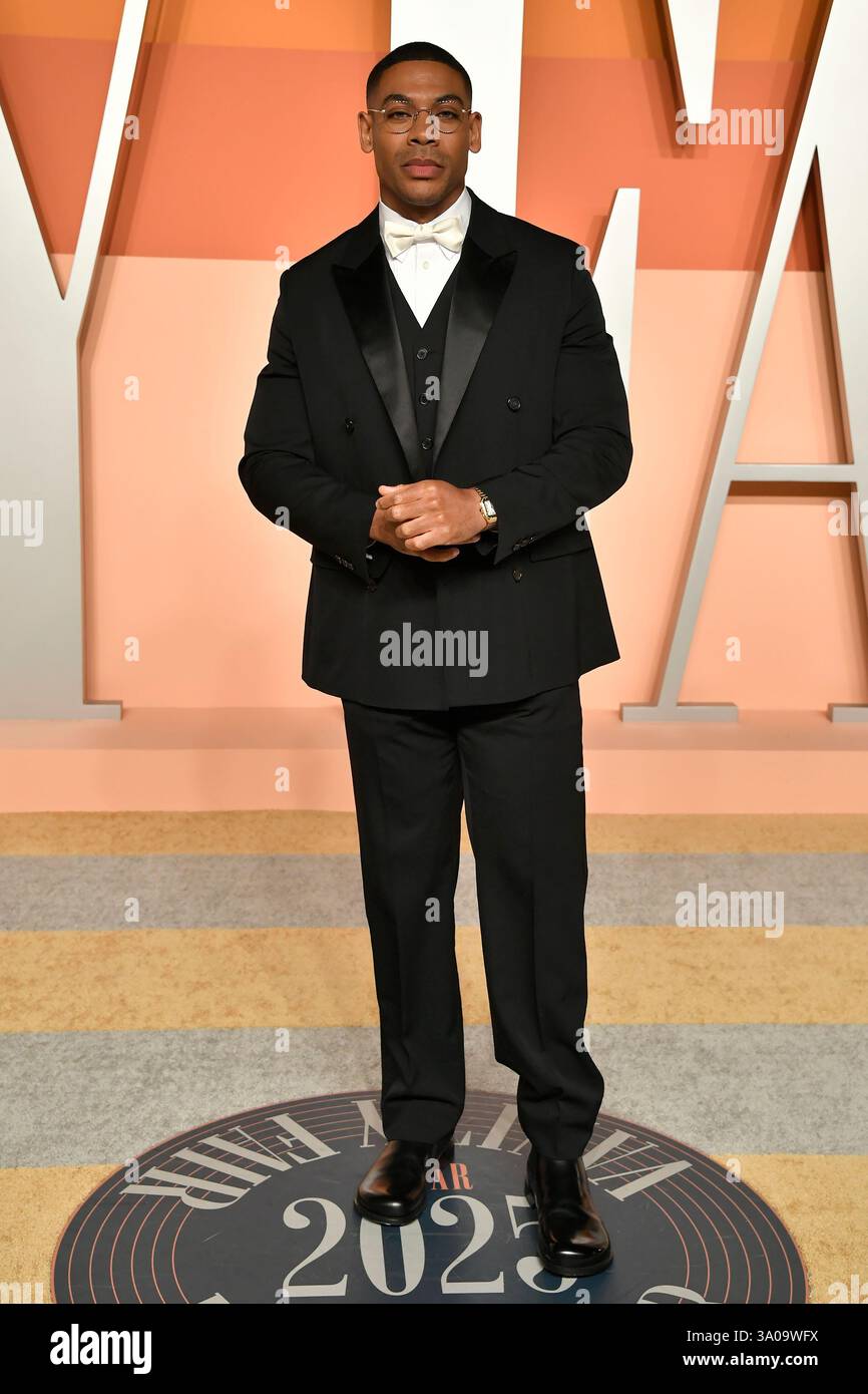 Aaron Pierre arrives at the Vanity Fair Oscar Party on Sunday, March 2 ...
