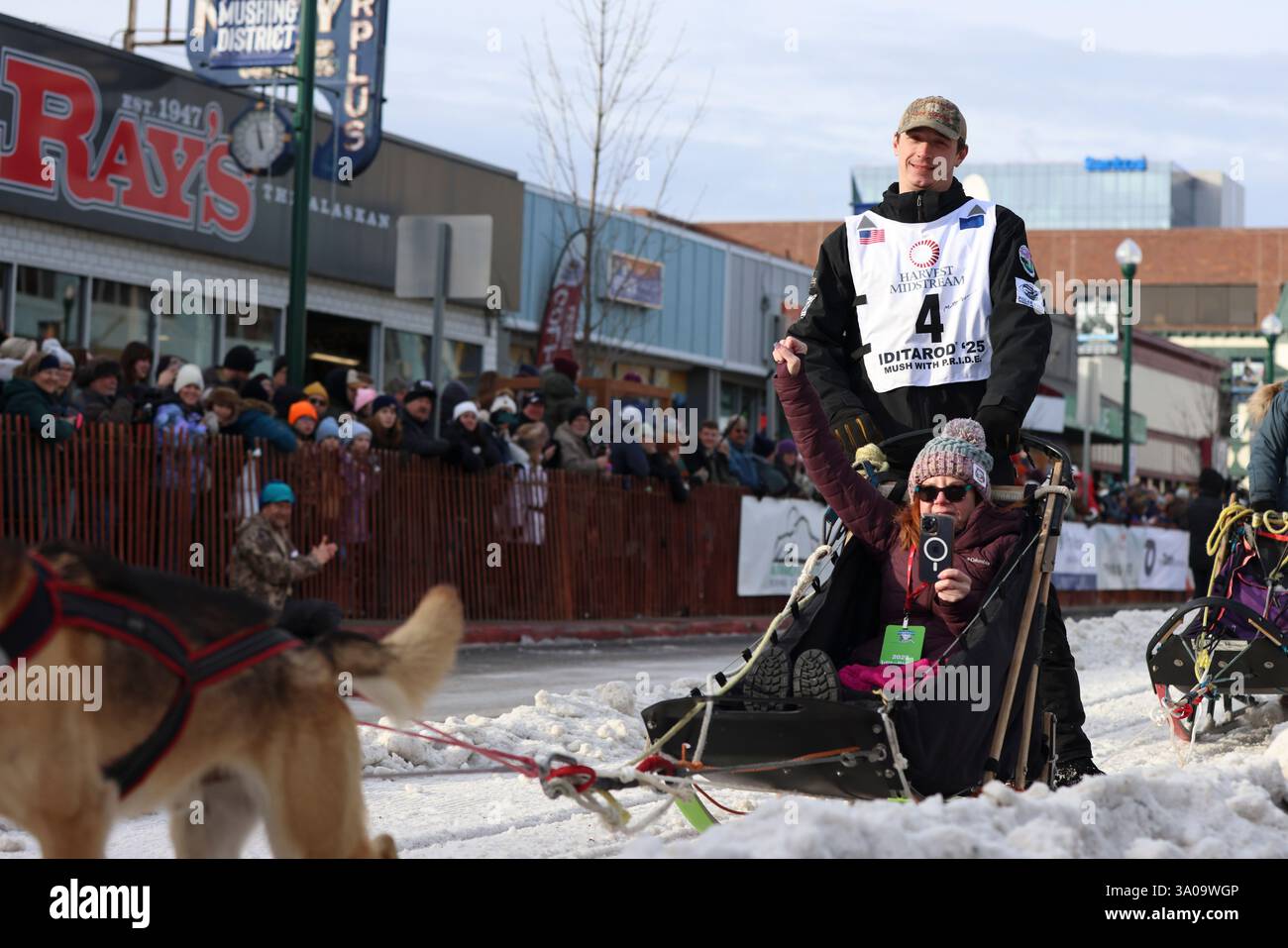 Matt Hall (4), of Two Rivers, Alaska, mushes down Fourth Street during ...