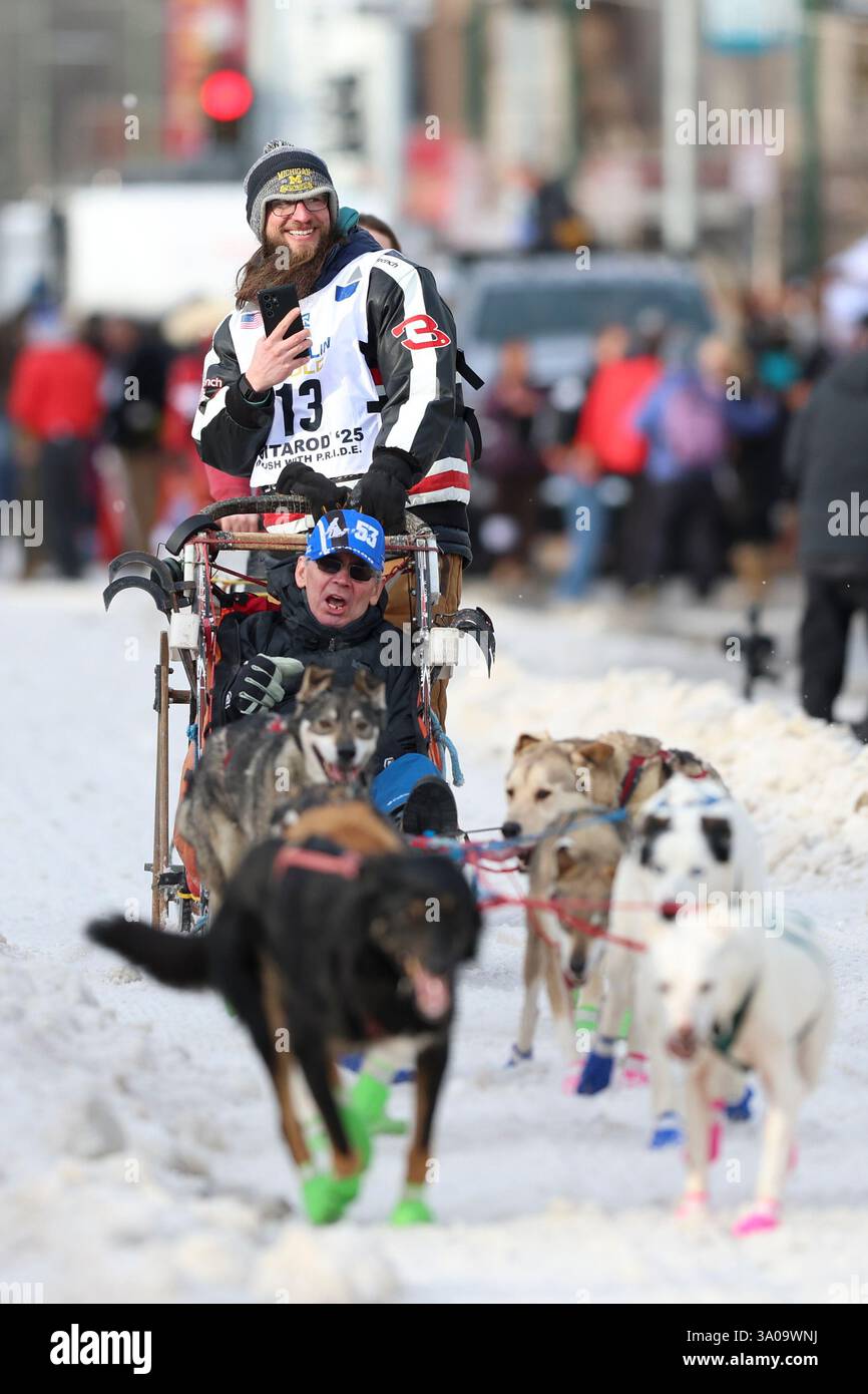Keaton Loebrich (13), of Midland, Michigan, films on his phone while ...