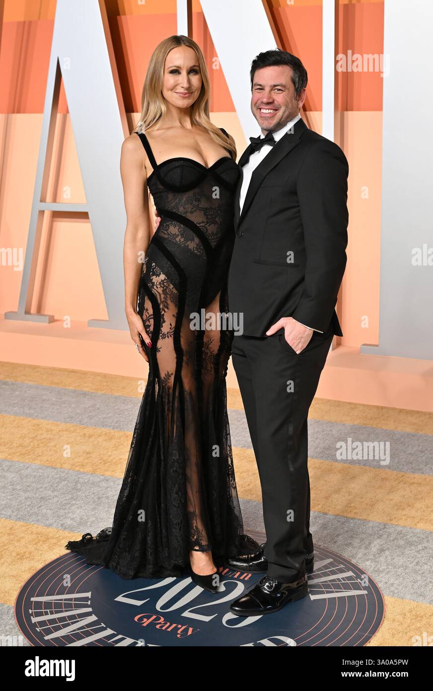 Nikki Glaser and Chris Convy arriving at the Vanity Fair Oscar Party ...