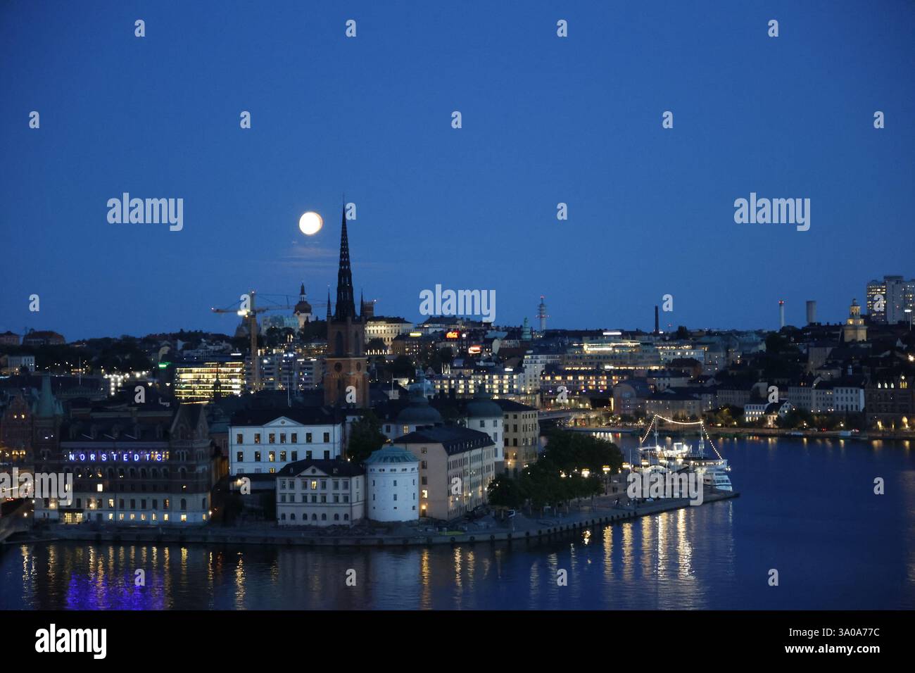 Moon rise over Stockholm city centre Stock Photo - Alamy