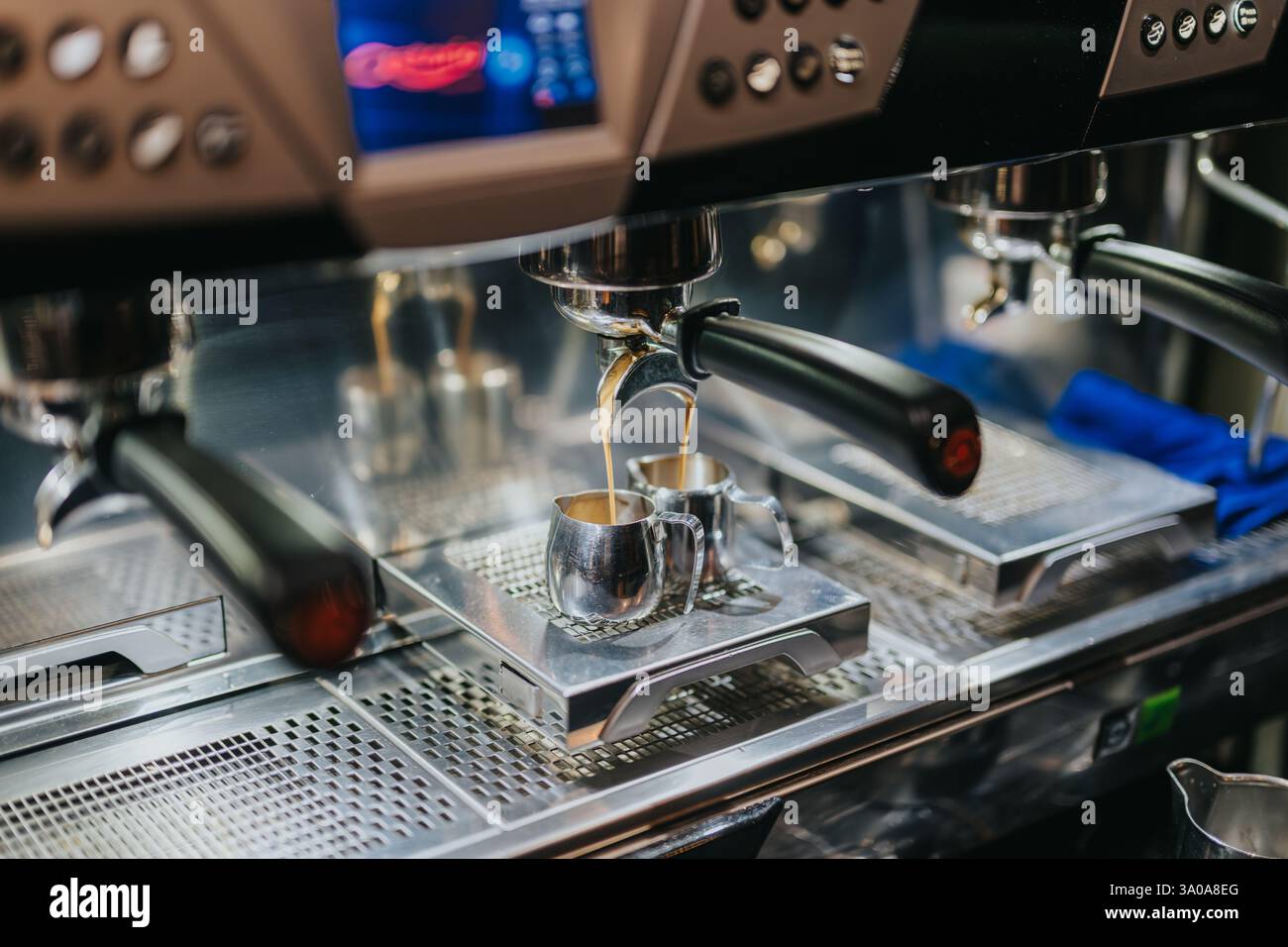 Espresso brewing in professional coffee machine at cafe Stock Photo - Alamy