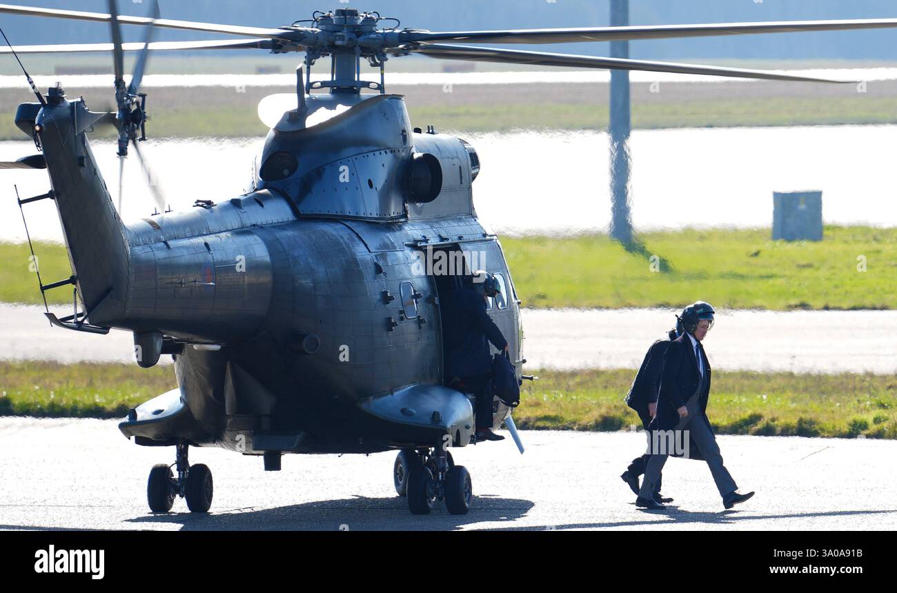 Prime Minister Justin Trudeau arrives by helicopter to depart Stansted ...