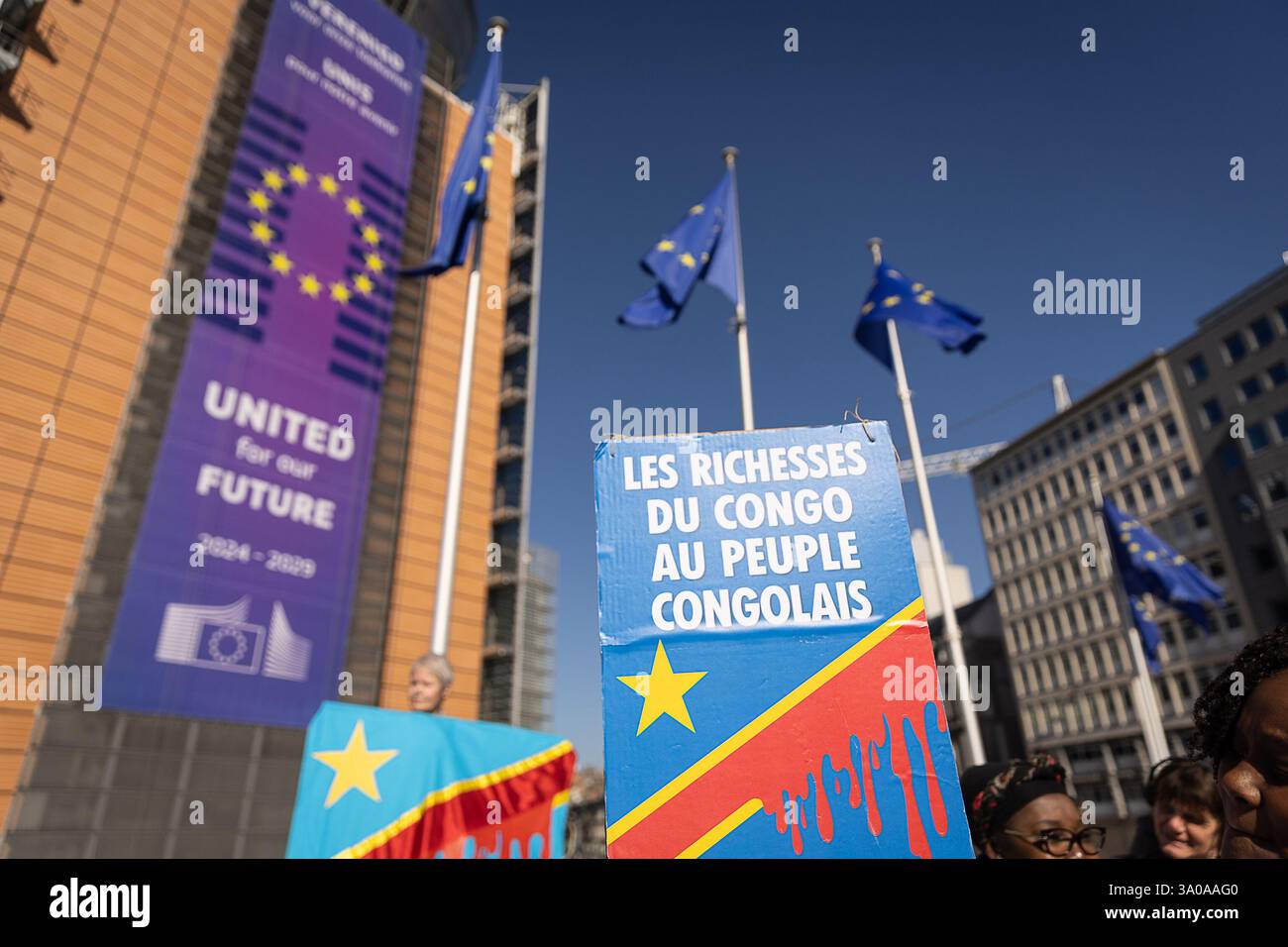 People hold a demonstration to denounce Rwanda's aggression in eastern ...