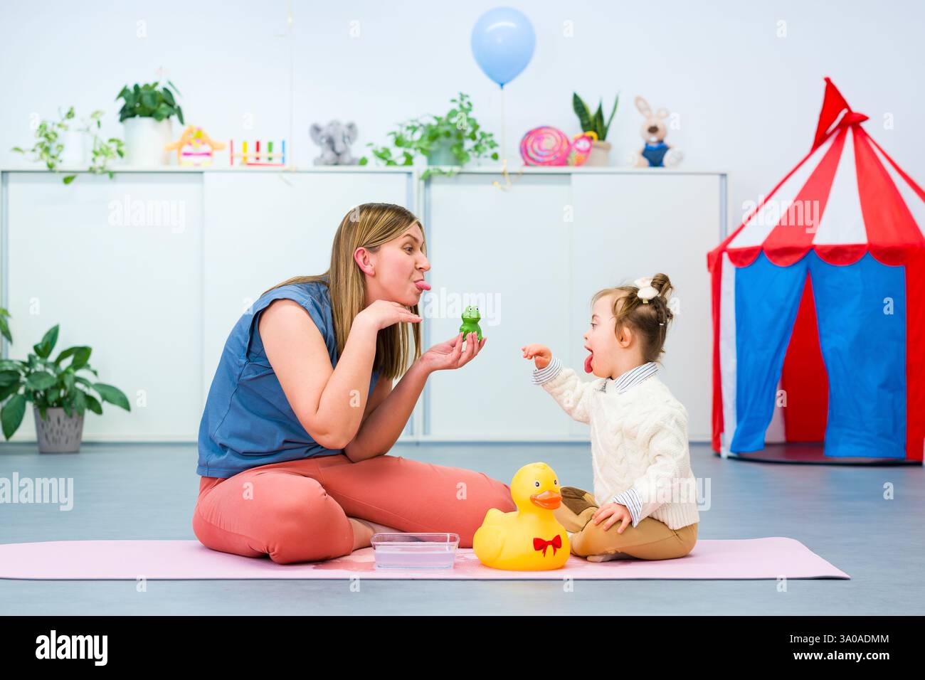 Nonverbal child with Down syndrome learning baby sign language with the ...