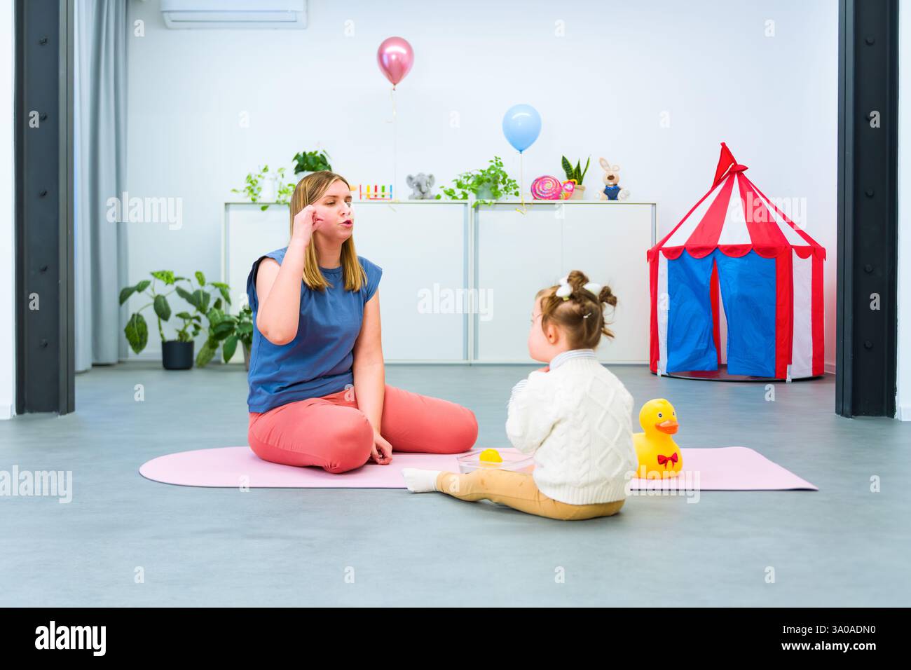 Nonverbal child with Down syndrome learning baby sign language with the ...