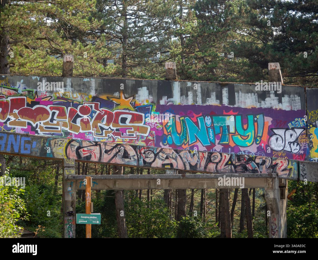 Abandoned bobsleigh track painted with colorful graffiti and left to ...
