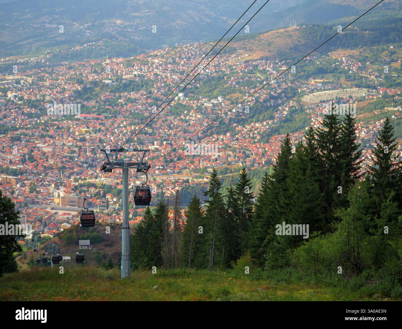 Cityscape of Sarajevo in the background with houses. View of the cable ...