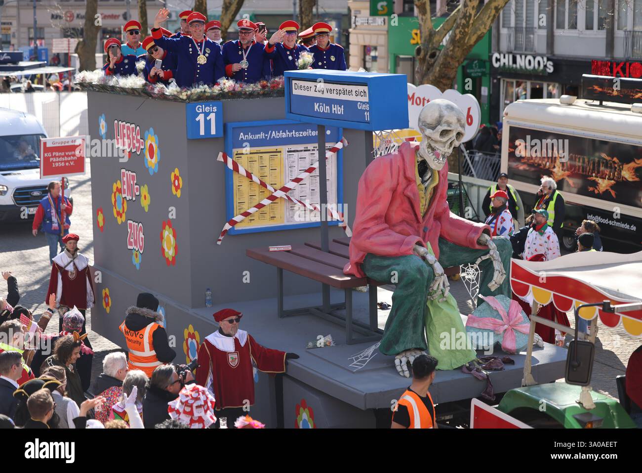 Cologne, Germany. 03rd Mar, 2025. A float with a rail delay theme ...