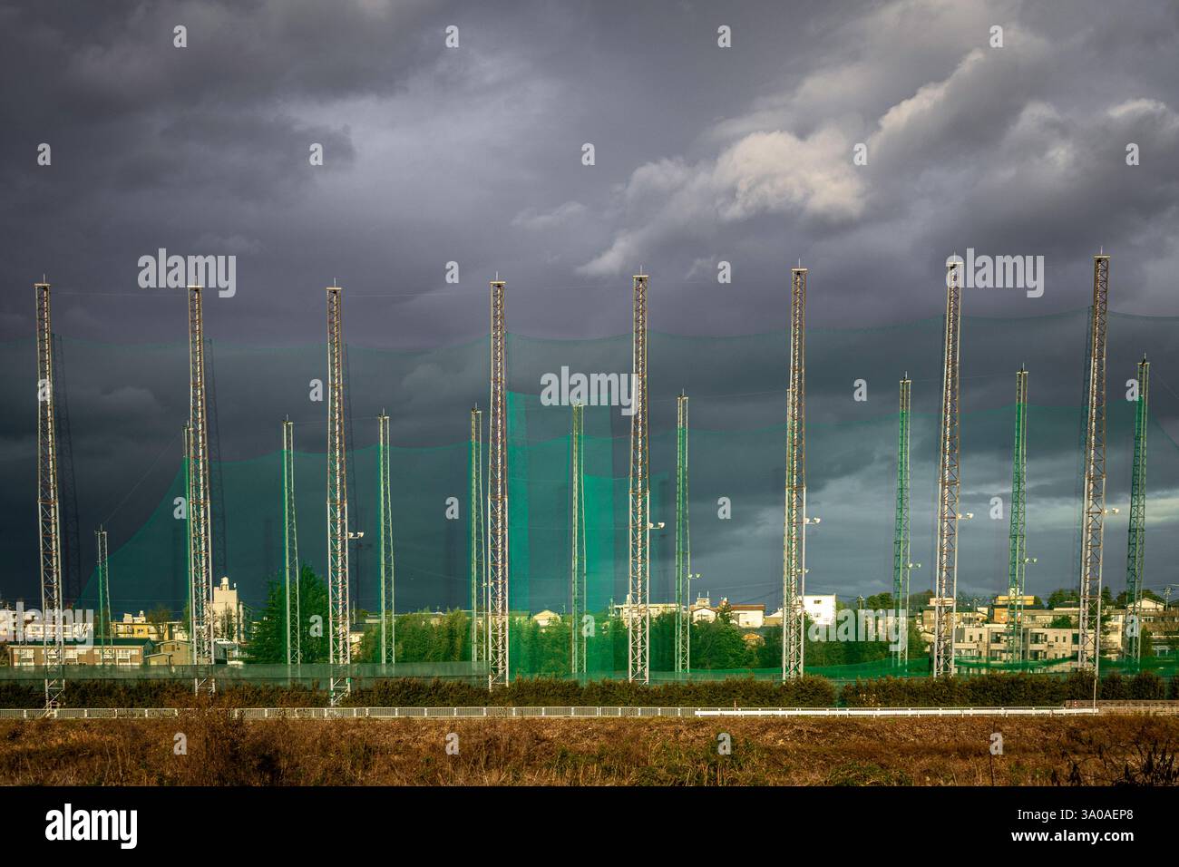 Outdoor golf driving practice range with netting, Hanazato, Kanazawa ...