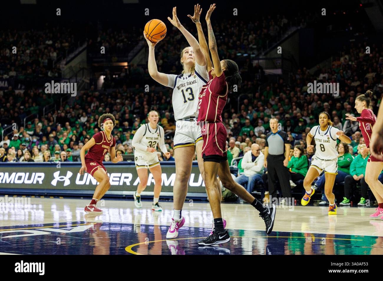 Notre Dame forward Kate Koval (13) shoots over Florida State forward ...