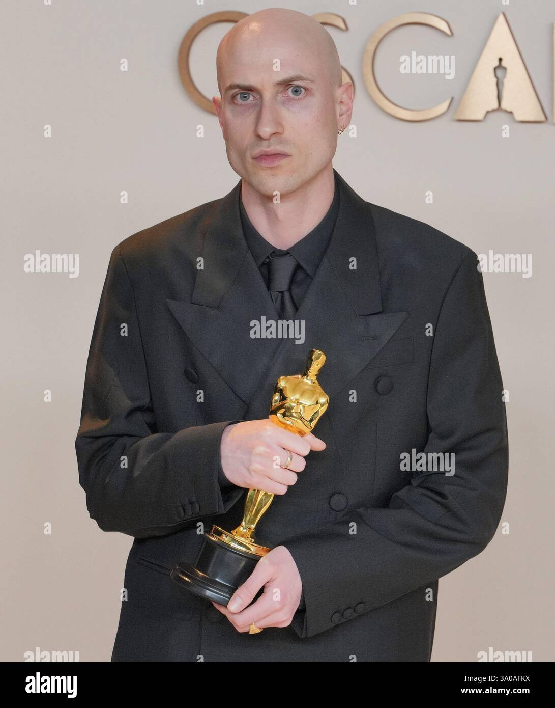 Daniel Blumberg, winner of the Best Original Score award for “The Brutalist”, posing in the ...