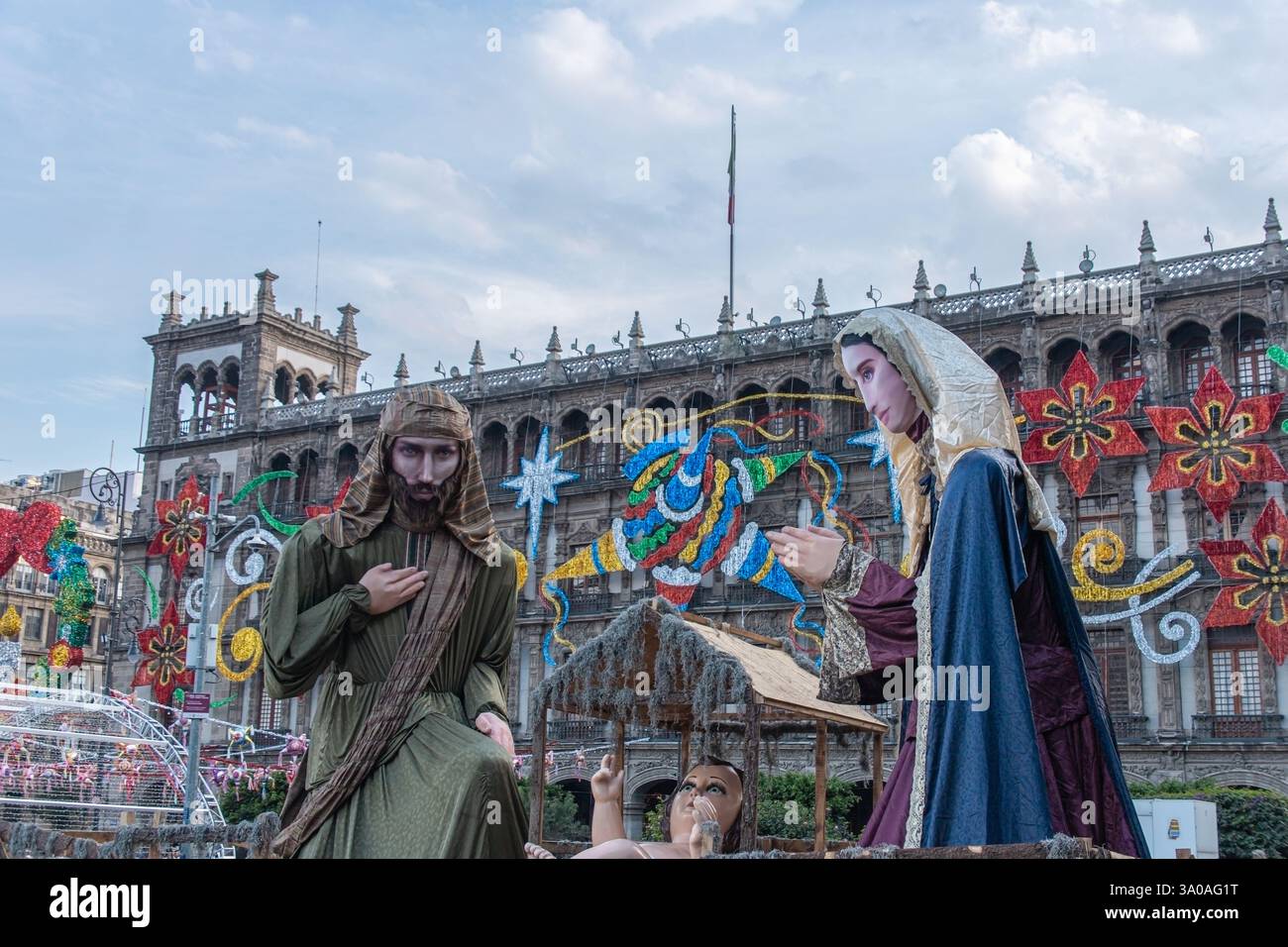 A large nativity scene featuring statues of Mary, Joseph, and baby ...