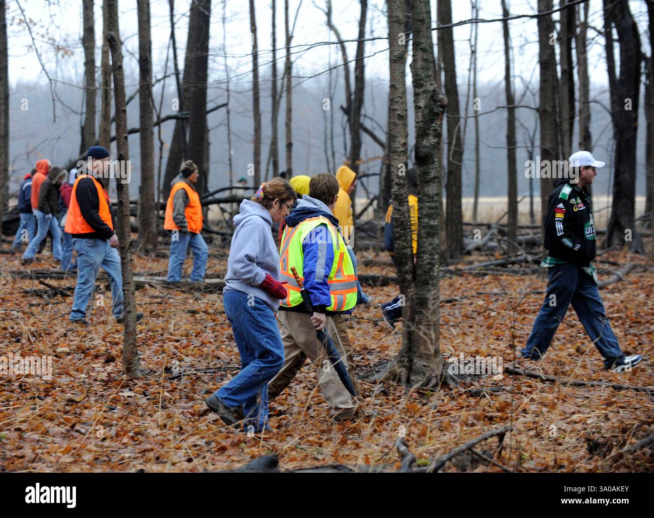 FILE - Volunteers and rescuers search for 9-year-old Andrew, 7-year-old ...
