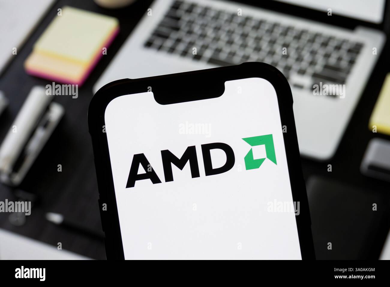 In this photo illustration, the AMD logo seen displayed on a smartphone ...