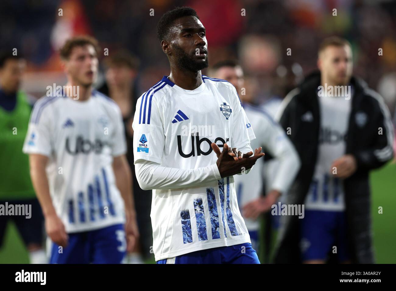 Rome, Italy 2.03.2025 : Alie Fadera of Como greets fans at end of the ...