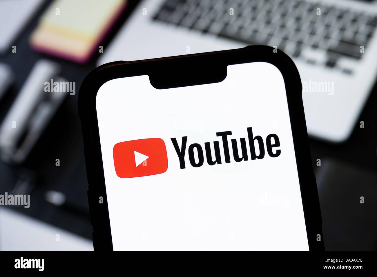 In this photo illustration, a YouTube logo seen displayed on a smartphone. (Photo by Mateusz ...