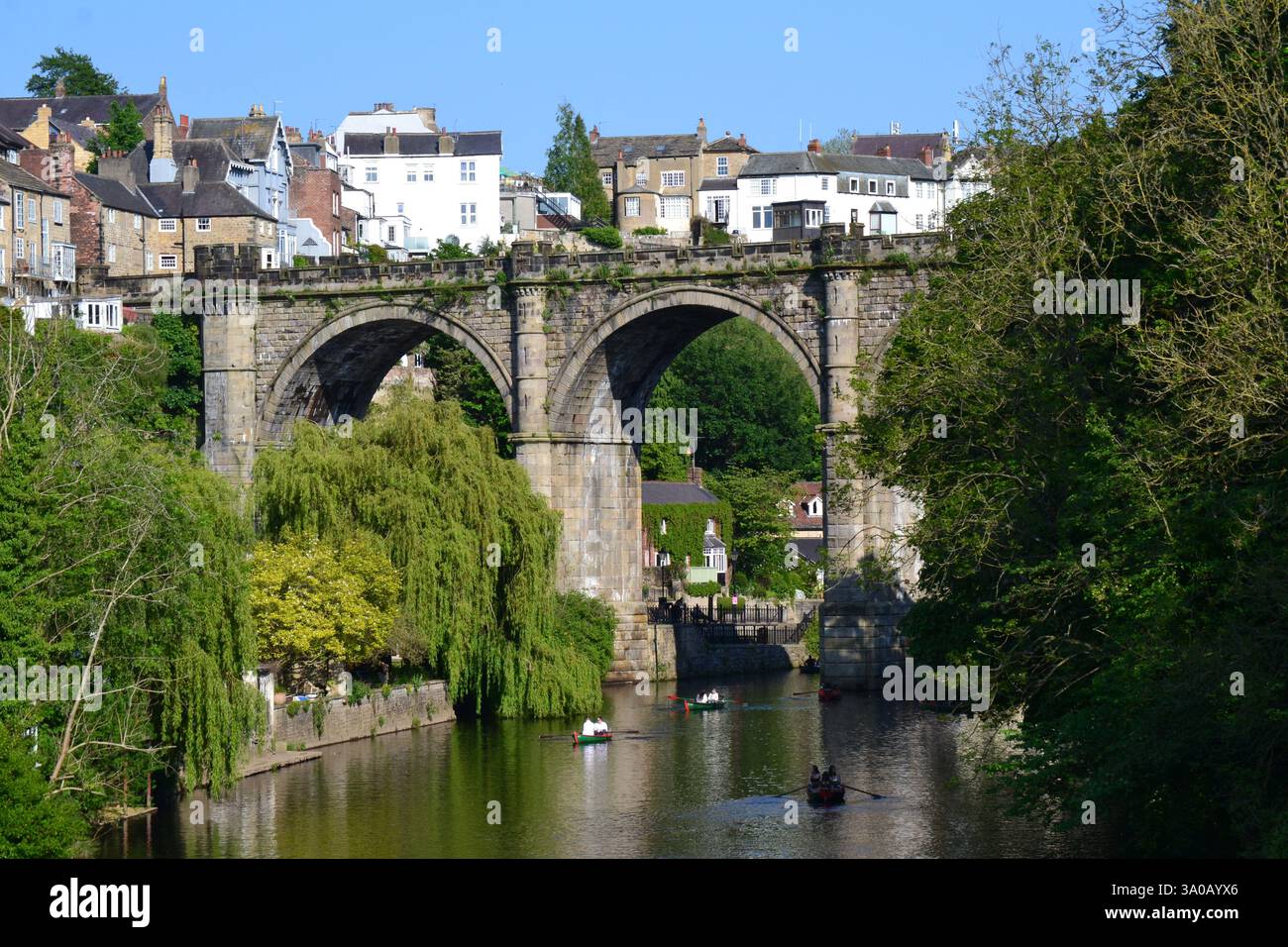 Scenic view of Knaresborough Viaduct reflecting in the River Nidd ...