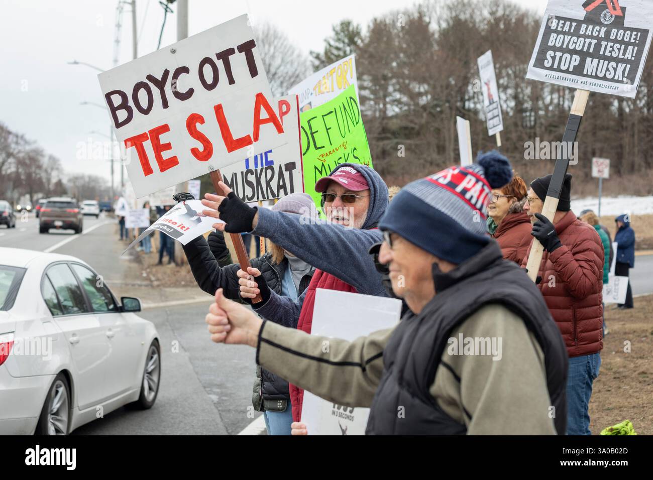 March 1, 2025. Peabody, MA. Dozens of protesters lined the edge of ...