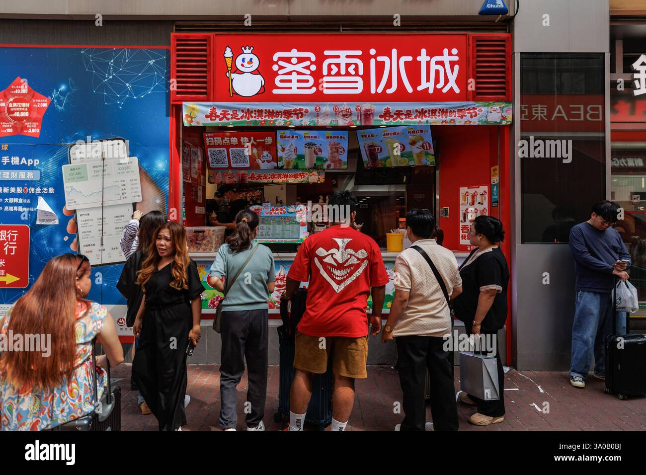 Hong Kong, China. 03rd Mar, 2025. Customers wait in line for Mixue ice ...