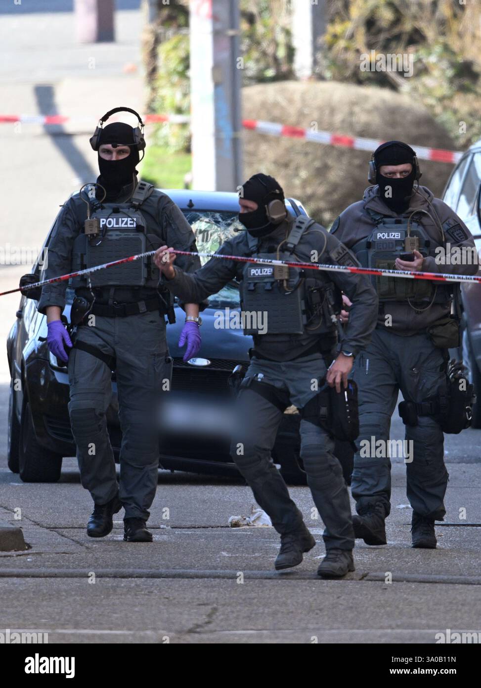 03 March 2025, Baden-Württemberg, Mannheim: Officers from the police ...