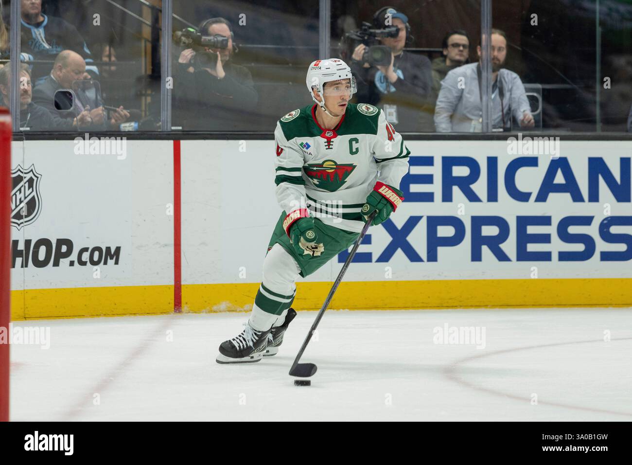 Minnesota Wild defenseman Jared Spurgeon (46) moves the puck on the ice ...