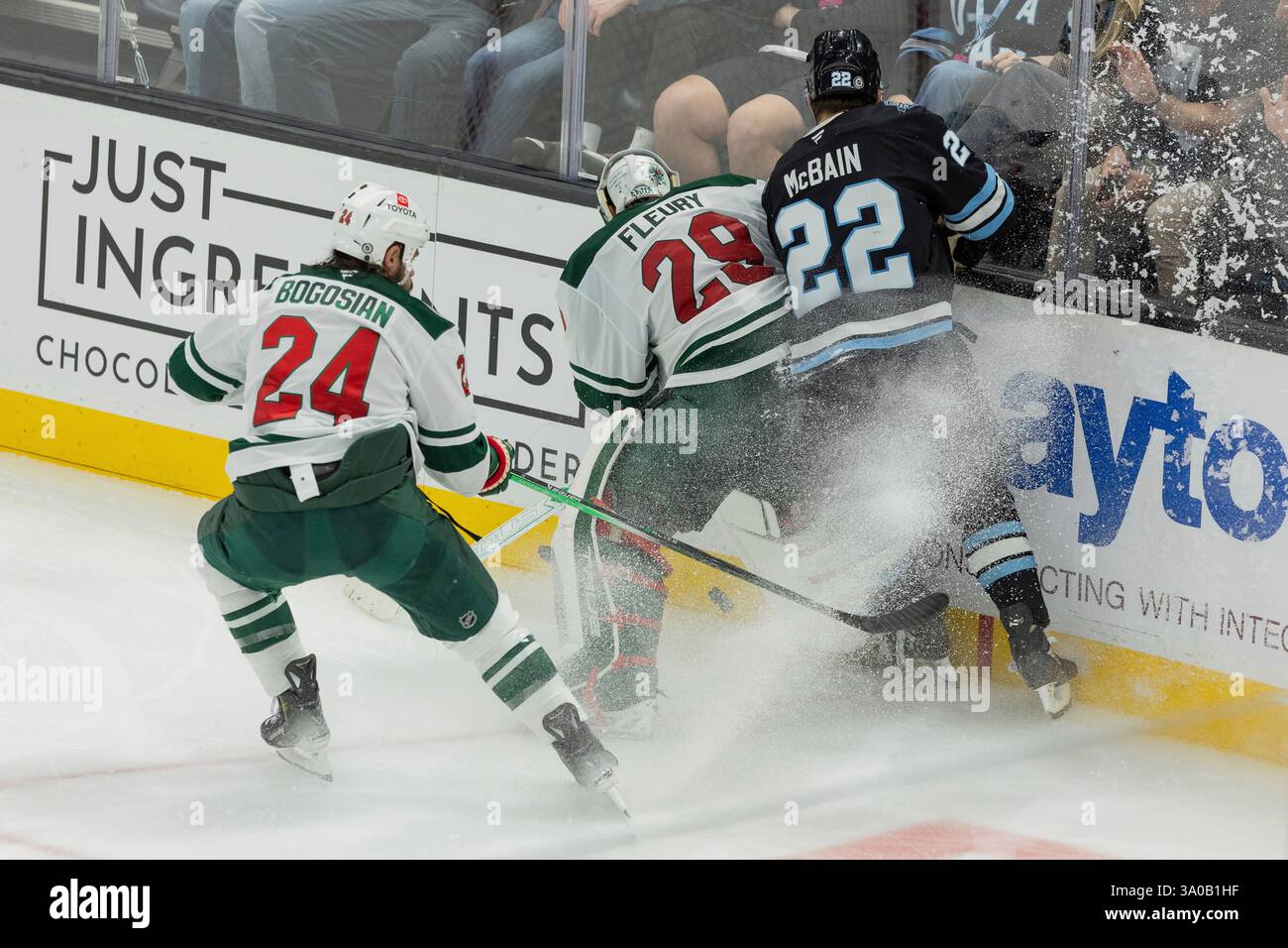 Minnesota Wild defenseman Zach Bogosian (24) and goalie Marc-Andre ...