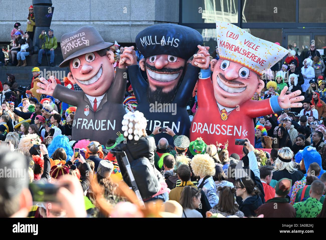 Duesseldorf, Germany. 03rd Mar, 2025. A float with the motto "Women ...