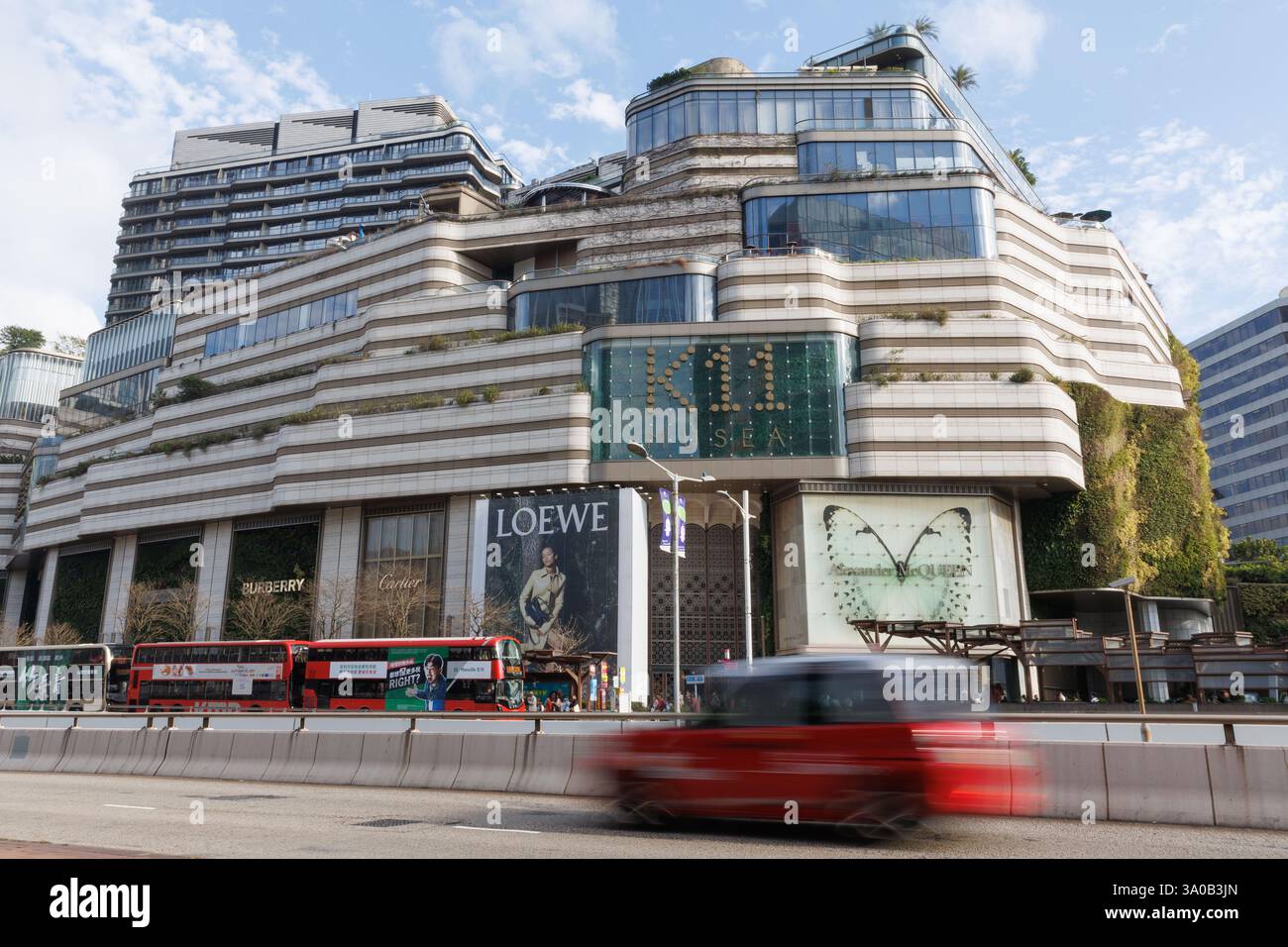 Hong Kong, China. 02nd Mar, 2025. A person walks past K11 Musea, a shopping mall combine with ...