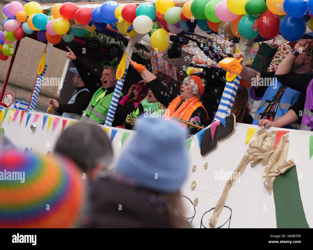 Marne, Germany. 03rd Mar, 2025. A float drives through the city center ...