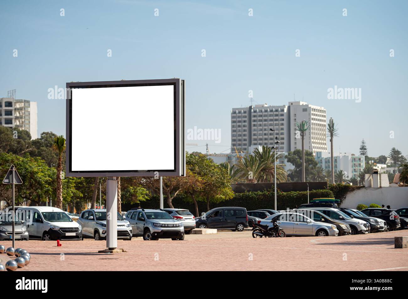 Billboard mockup installation in a busy parking lot in Morocco ...