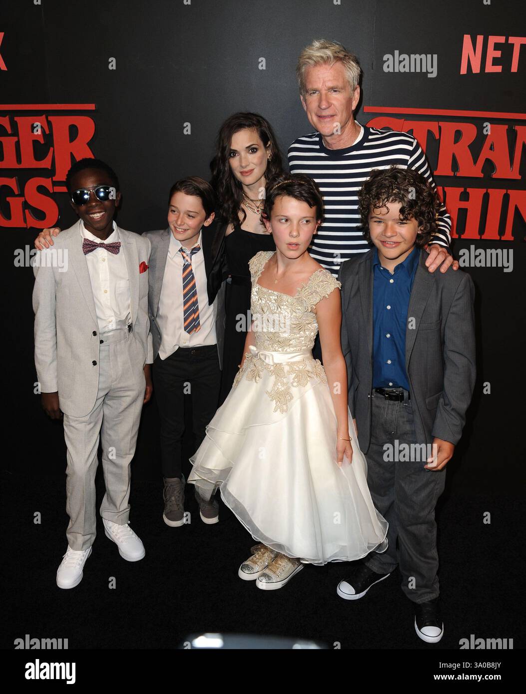 Winona Ryder, Matthew Modine and cast members arriving at the premiere ...
