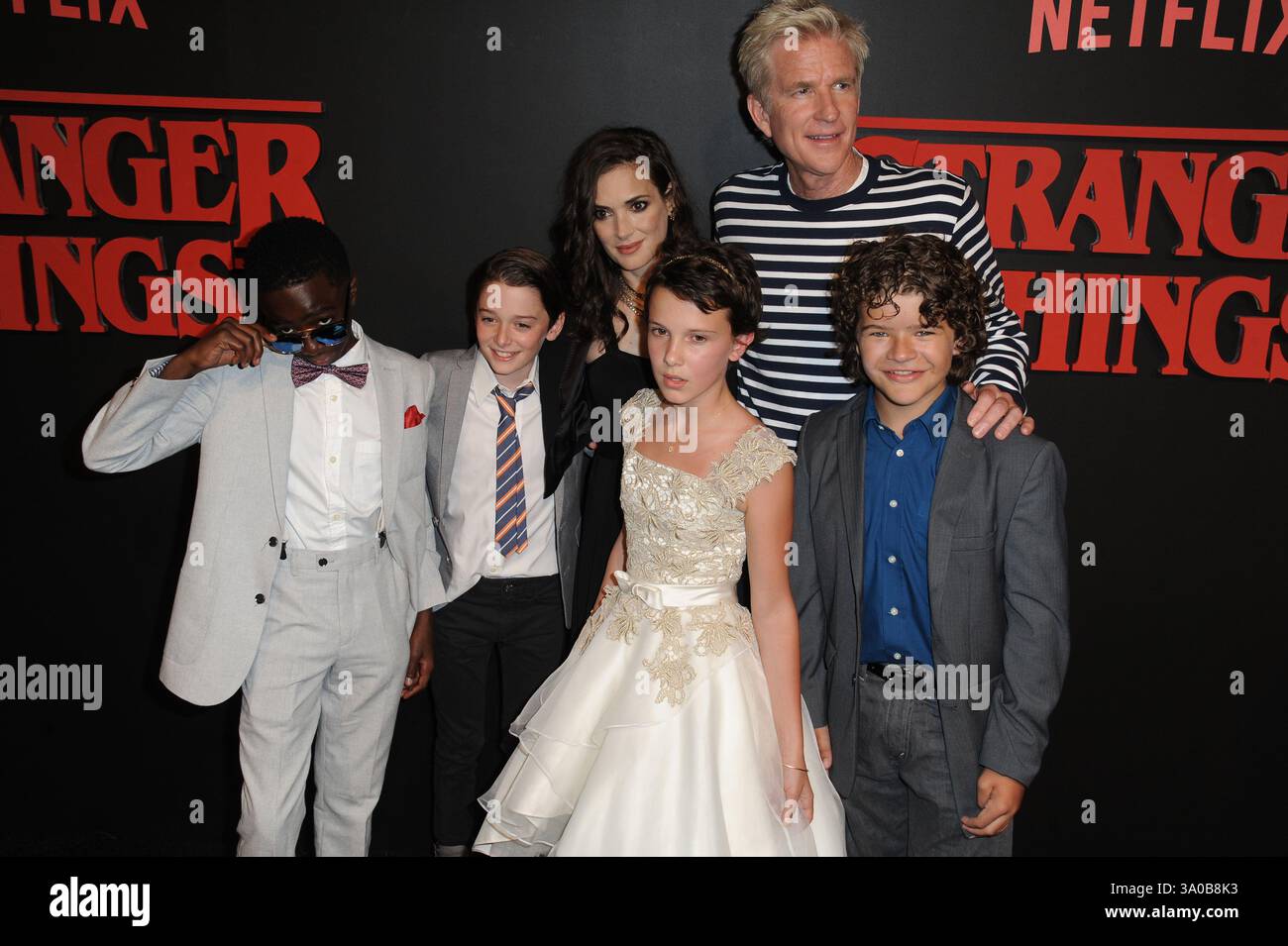 Winona Ryder, Matthew Modine and cast members arriving at the premiere ...