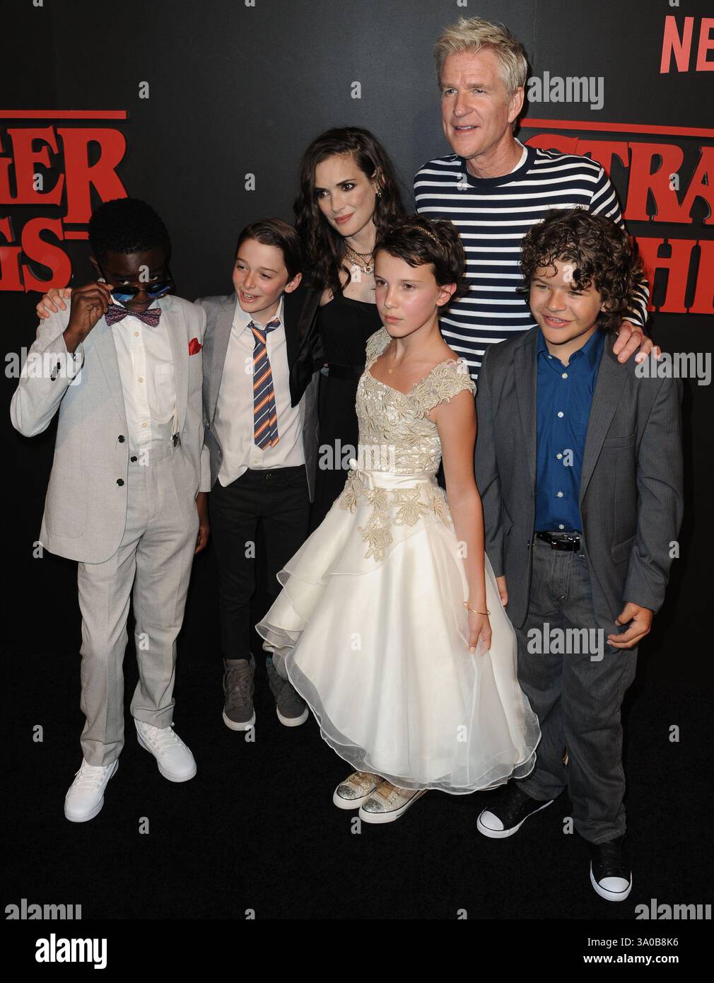 Winona Ryder, Matthew Modine and cast members arriving at the premiere ...