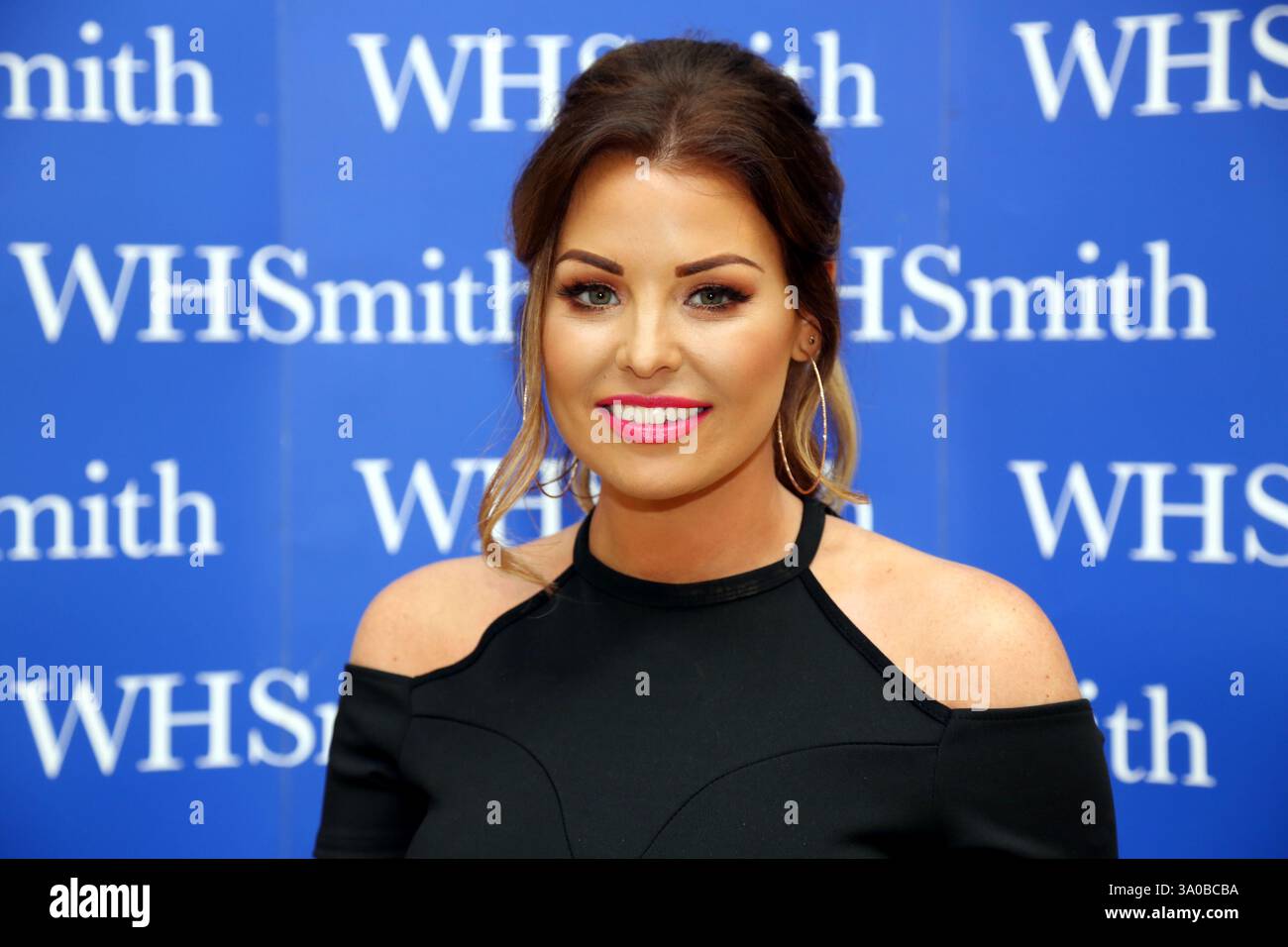 Jess Wright signing copes of her book Sparkling Stars at WH Smith in ...