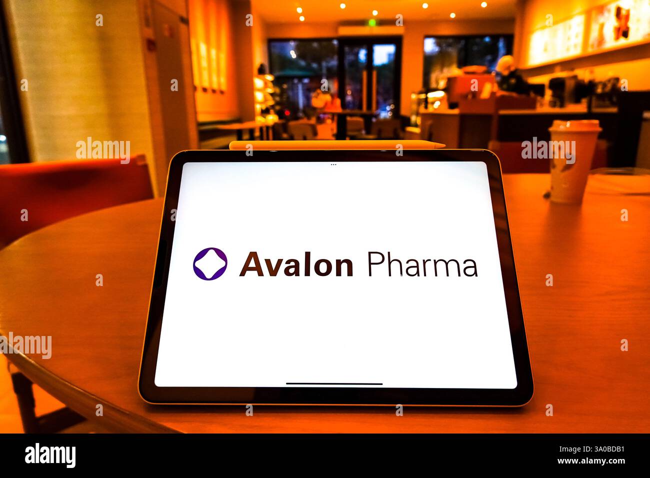 In this photo illustration, an Avalon Pharma logo is displayed on the screen of an iPad Stock ...