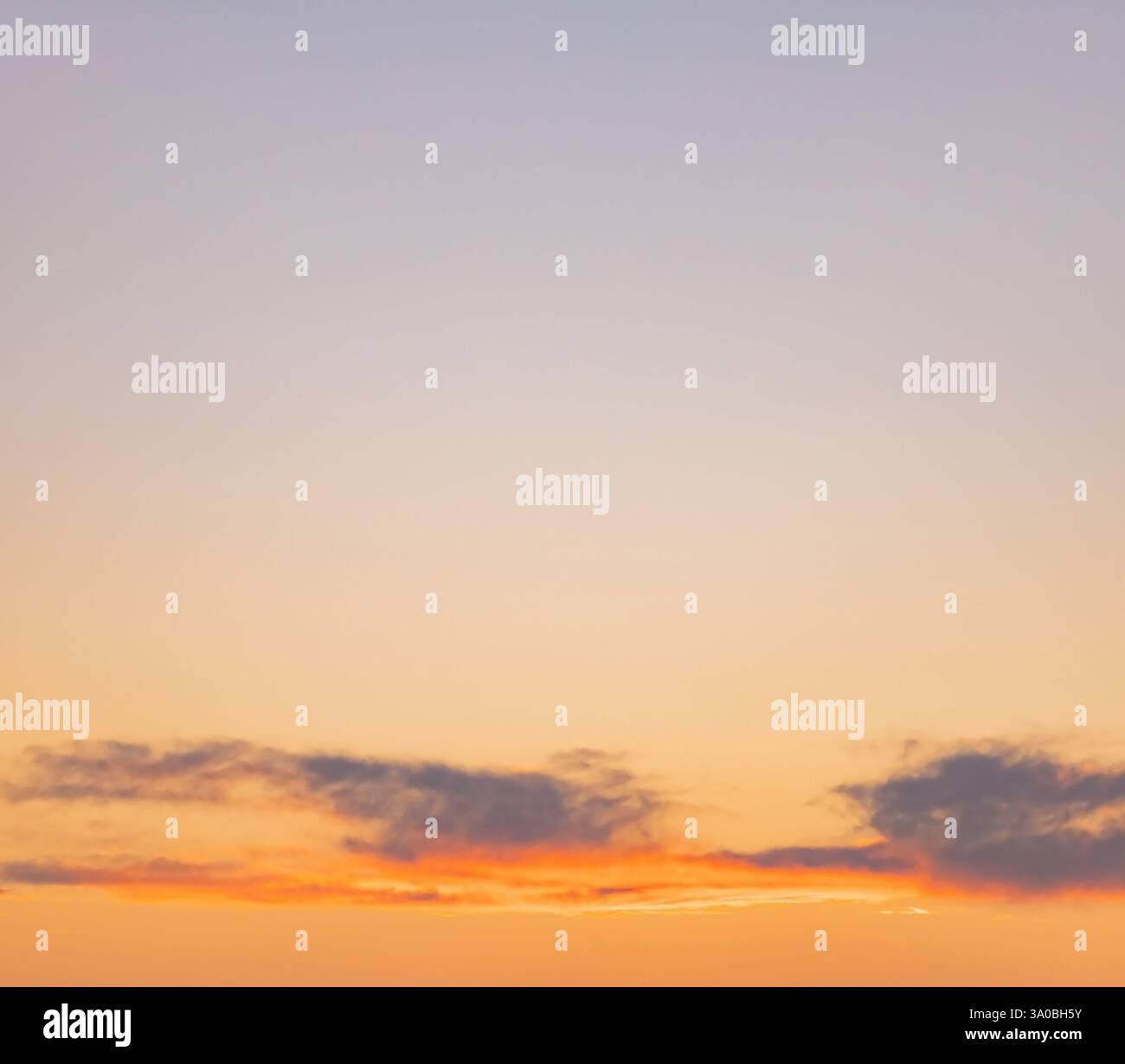 Blurred sunset sky with clouds Stock Photo - Alamy