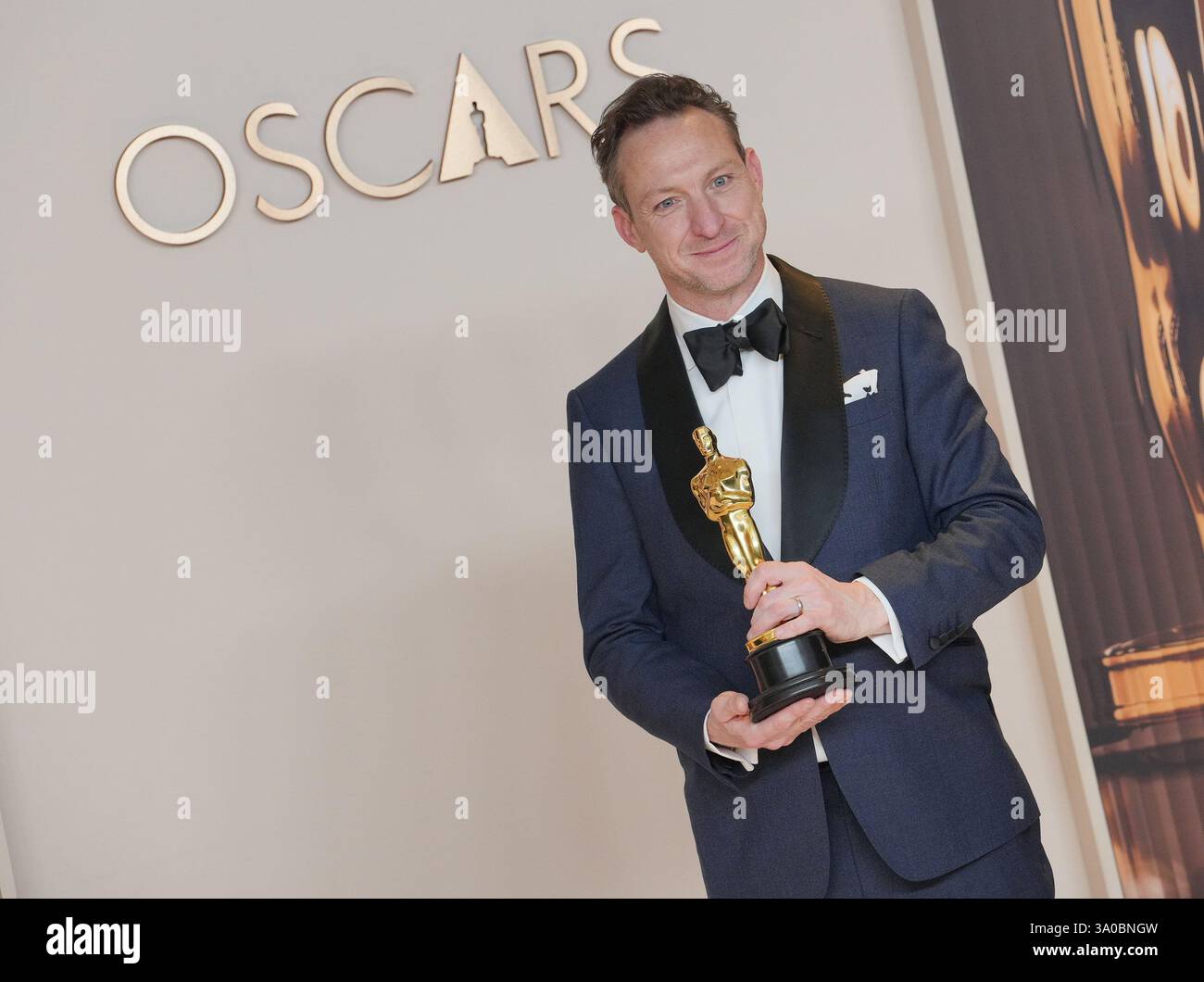 Lol Crawley, winner of the Best Cinematography for “The Brutalist”, posing in the press room at ...