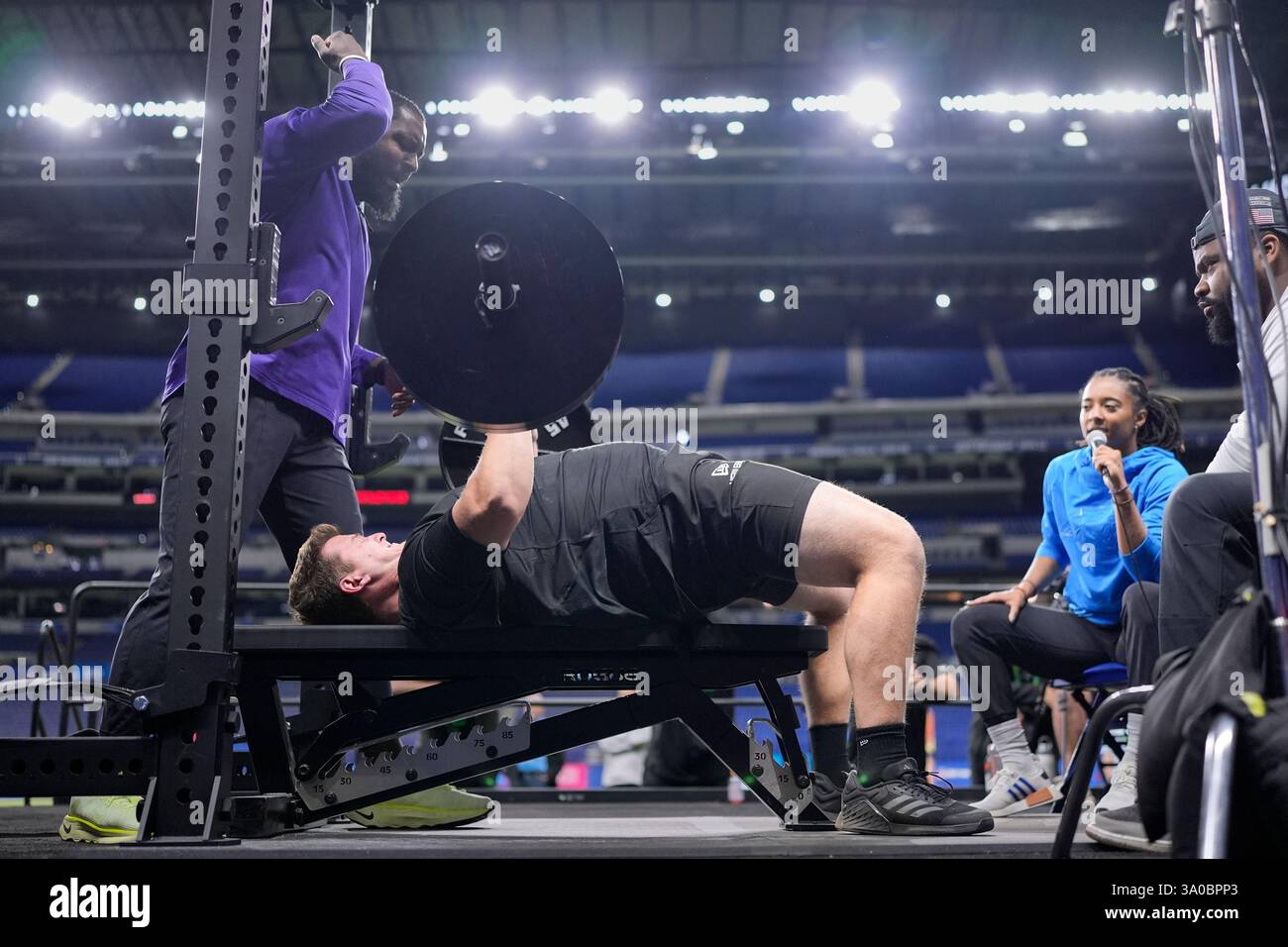 Boston College offensive lineman Drew Kendall, center, lifts weights at ...