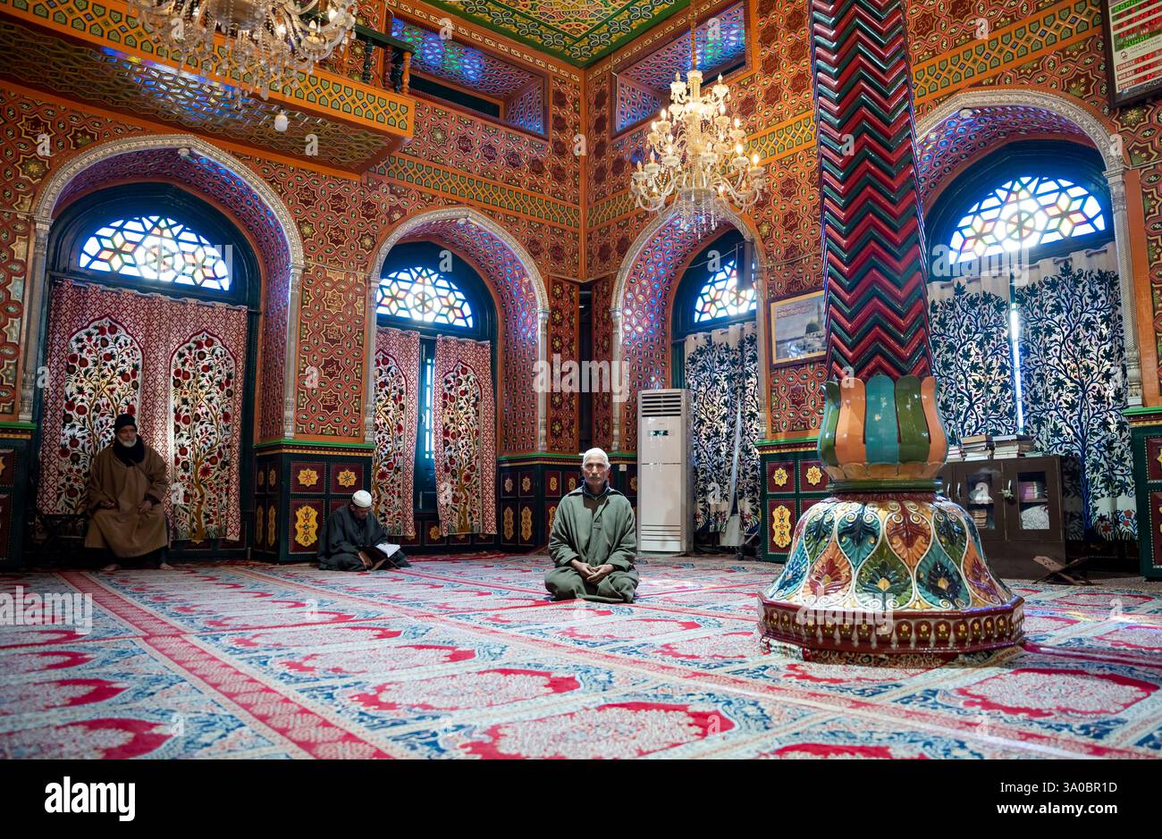 Srinagar, India. 03rd Mar, 2025. Kashmiri Muslims pray inside a shrine ...