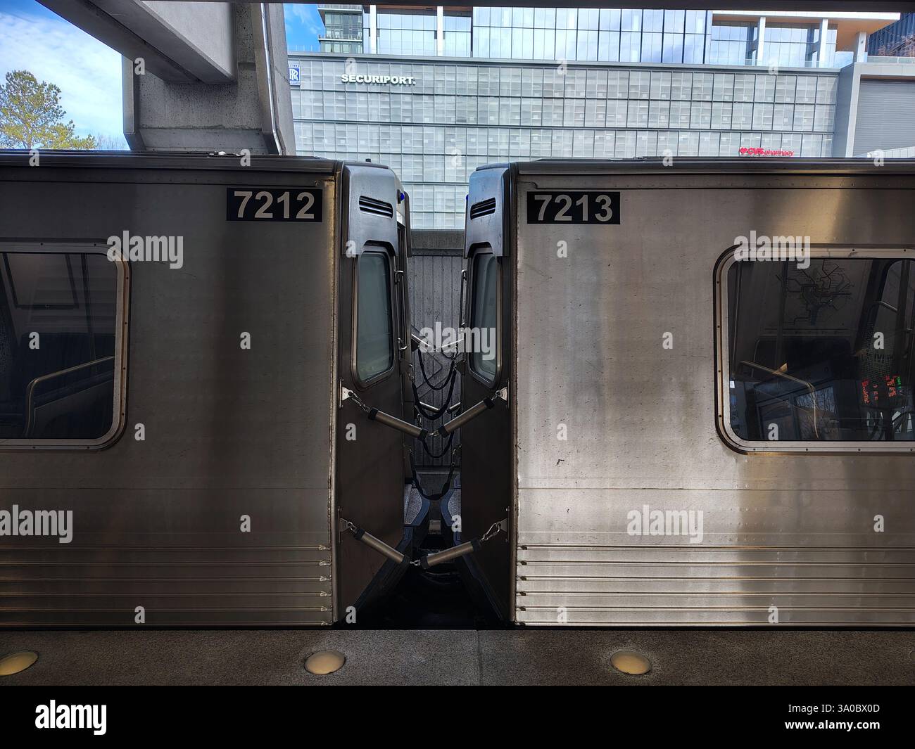 steel brown shiny subway train cars standing at ground station without ...