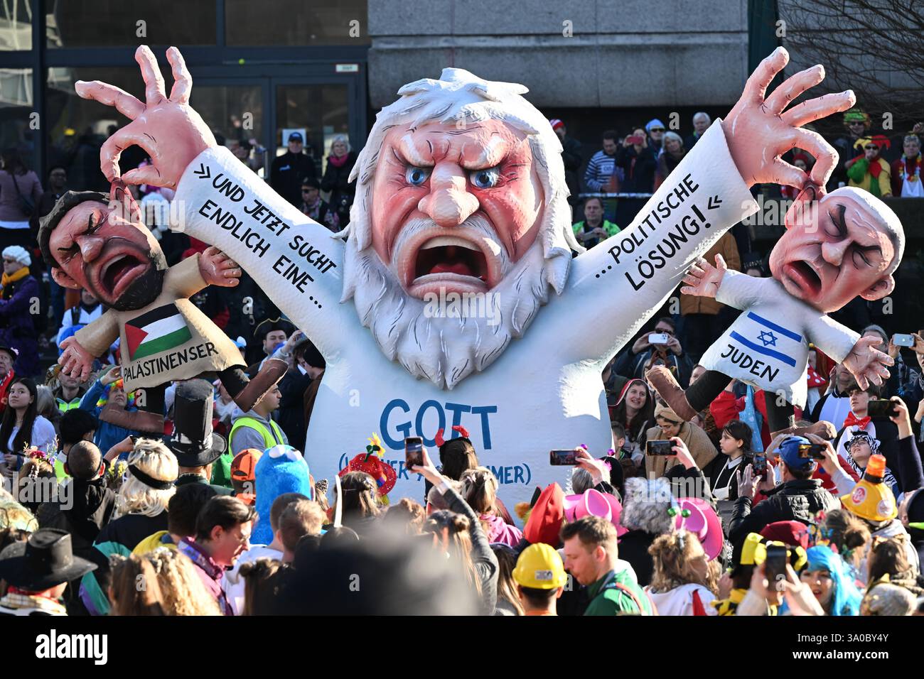 Duesseldorf, Germany. 03rd Mar, 2025. A float with the motto "And now ...